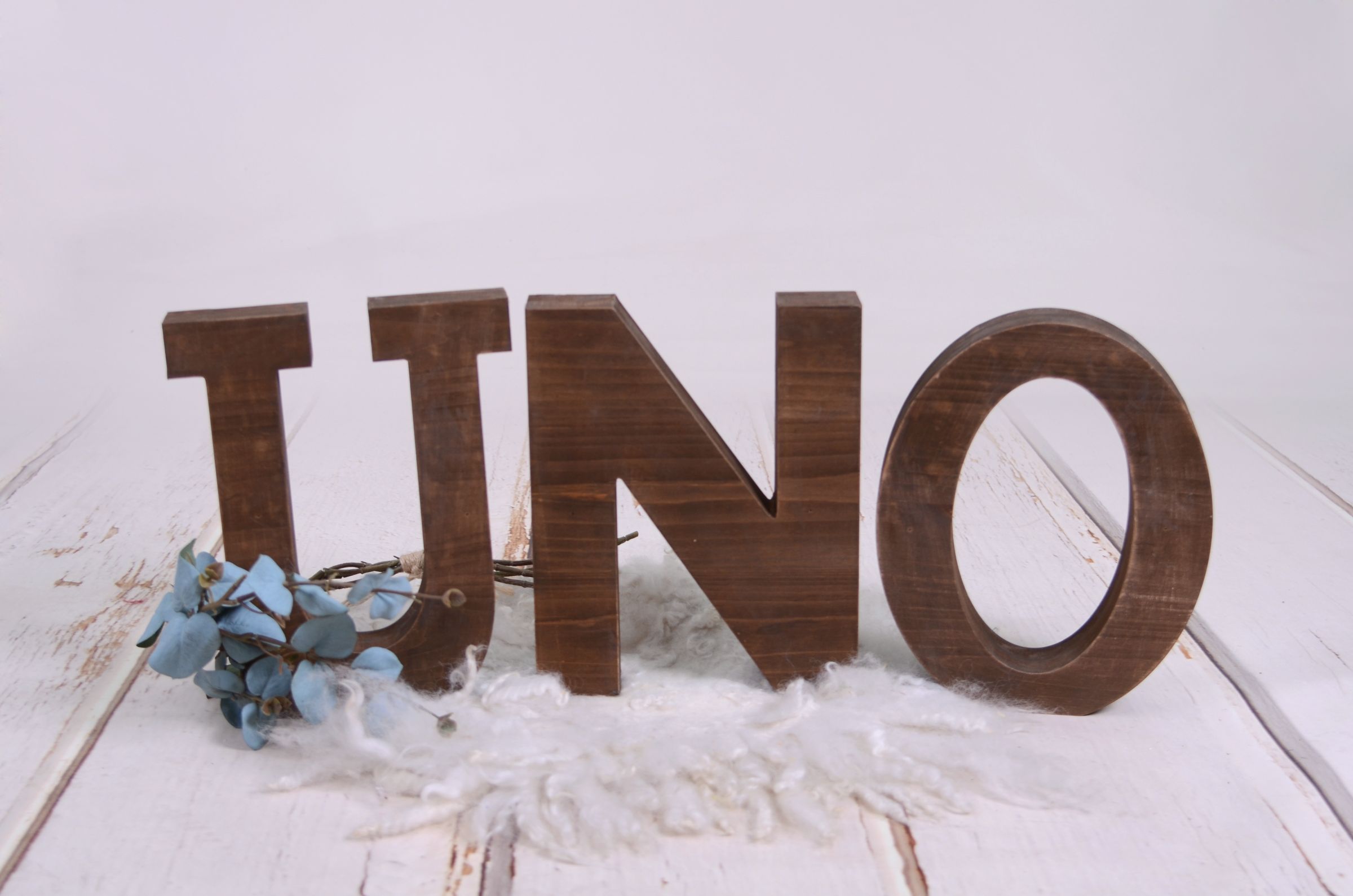 Large brown UNO letters